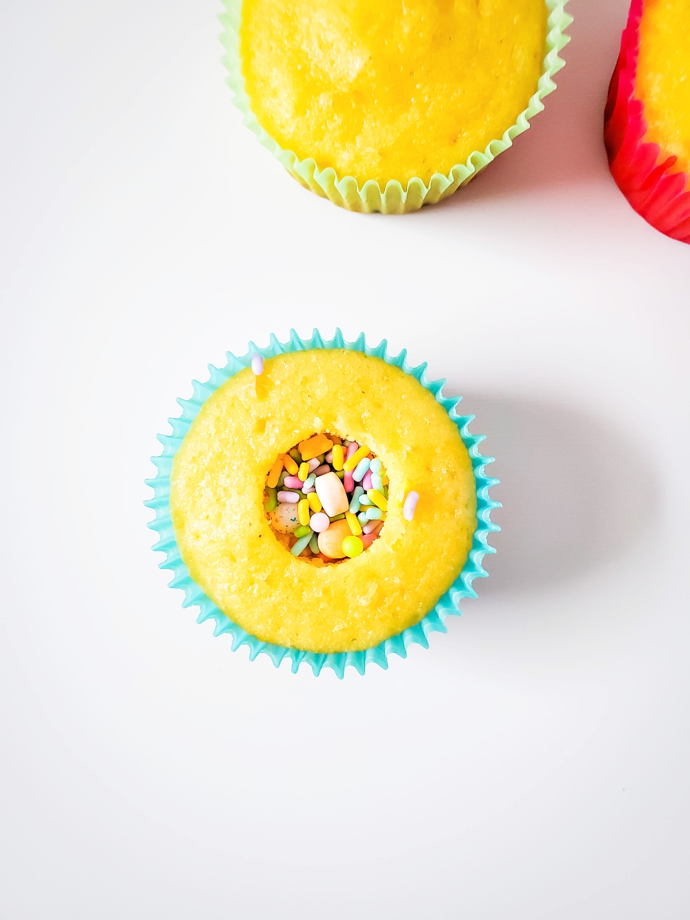 Celebration Sprinkle Surprise Cupcakes - Stef's Eats and Sweets